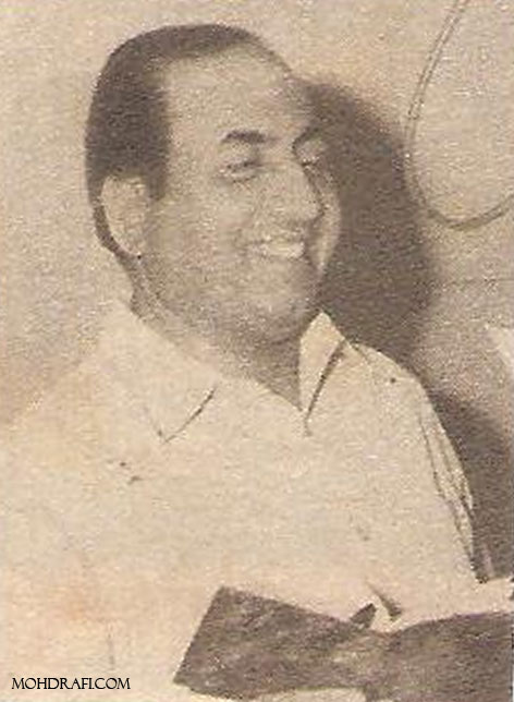 Mohd Rafi during a song recording / Mohd Rafi - Bollywood Photos