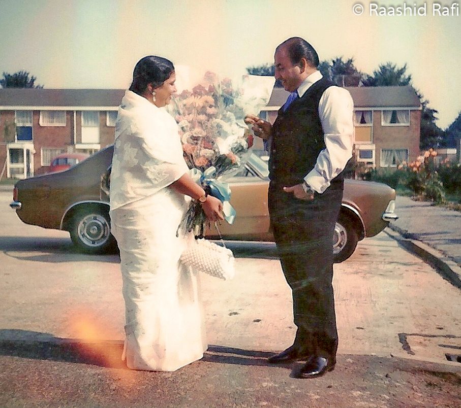 Mohd Rafi Sahab giving flowers to his wife, Bilquis Rafi on her 40th ...