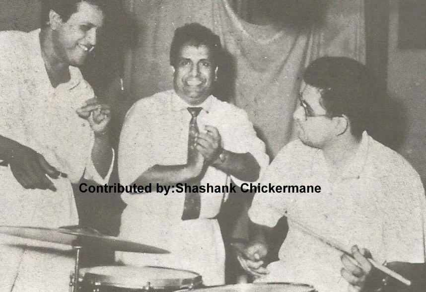 Shankar Jaikishan discussing with the musician Kersi lord in the ...
