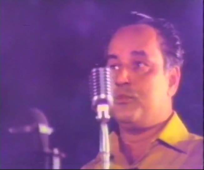 Mukesh singing in a concert / Mukesh - Bollywood Photos