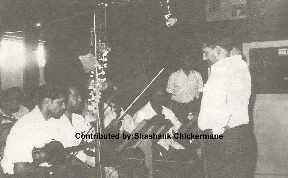 Shankar directing his musicians in the recording studio / Shankar ...