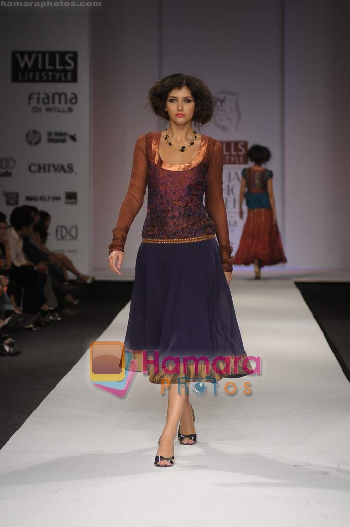 Models showcasing designs of Joy Mitra during Wills Fashion Week on Oct ...