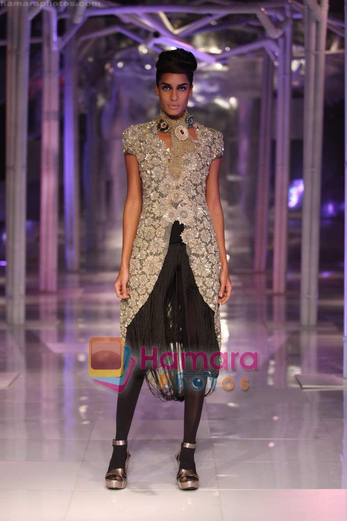 Model walk the ramp for Anamika Khanna Show at Pearls Delhi couture ...