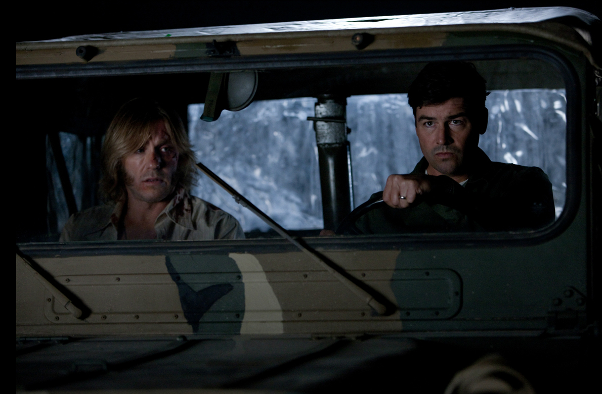 Kyle Chandler, Ron Eldard in the still from the movie Super 8 Eight ...