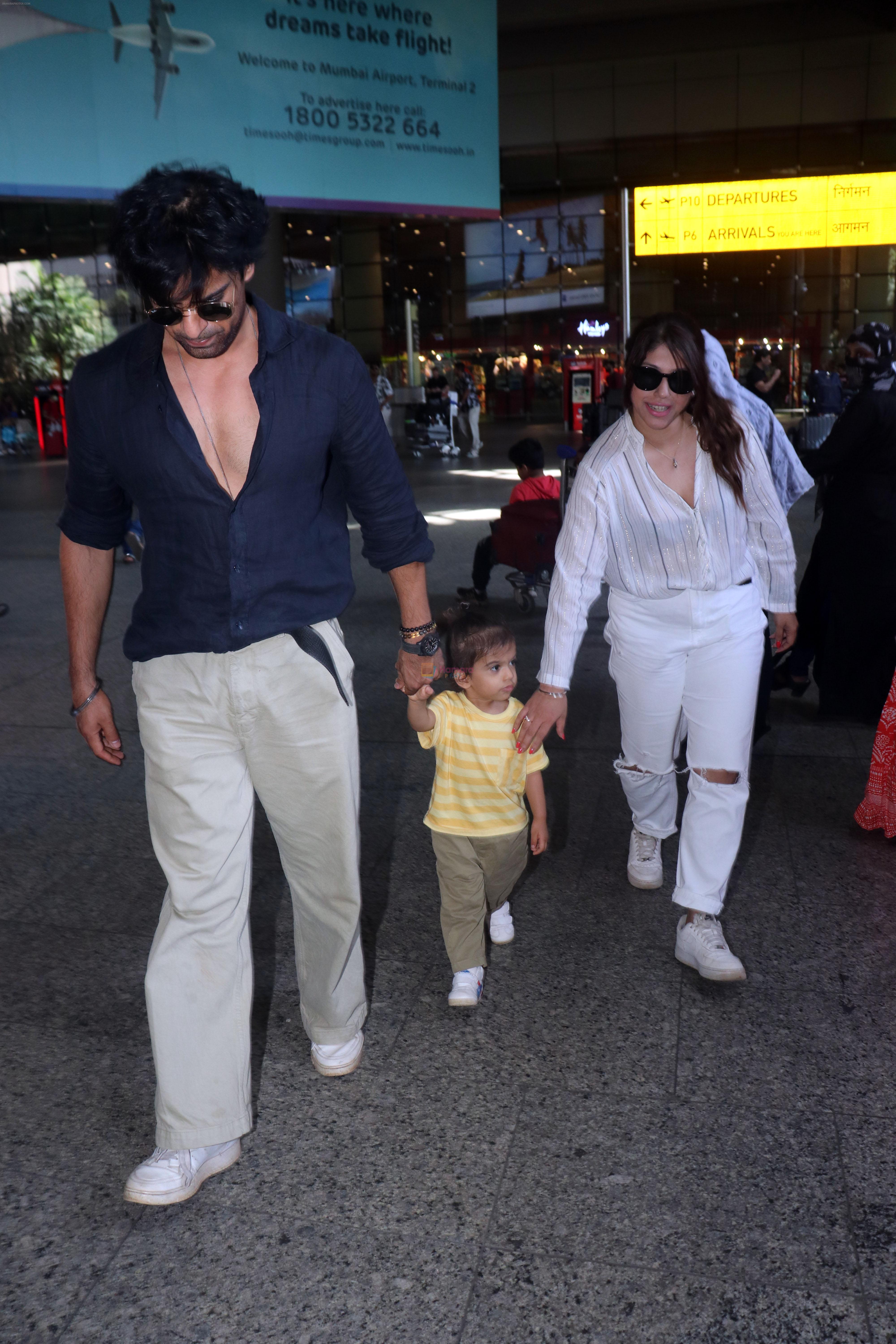 Addite Malik, Mohit Malik along with their child at the aiport on 20th ...