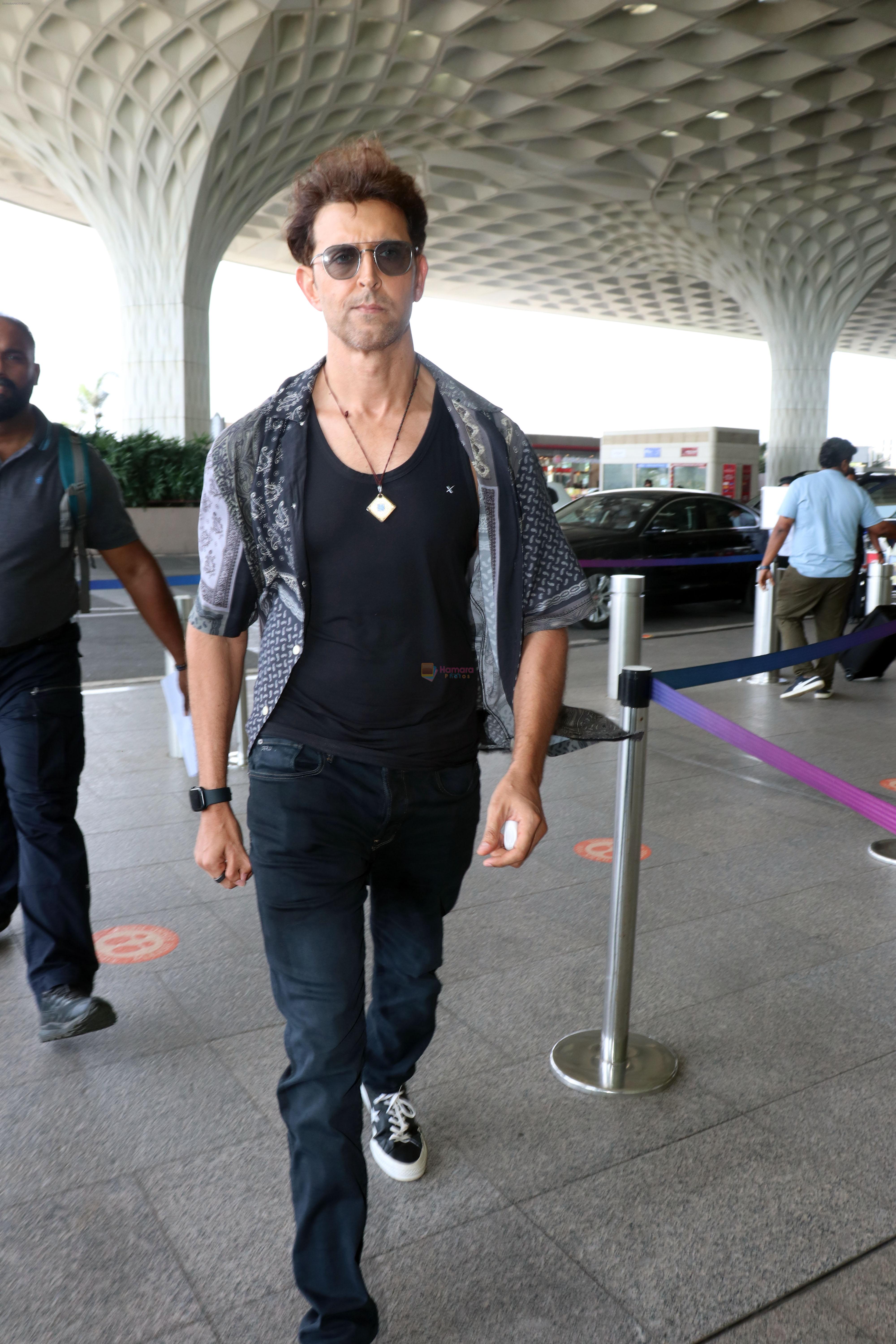 Hrithik Roshan in black teas unbuttoned shirt dark blue jeans and ...
