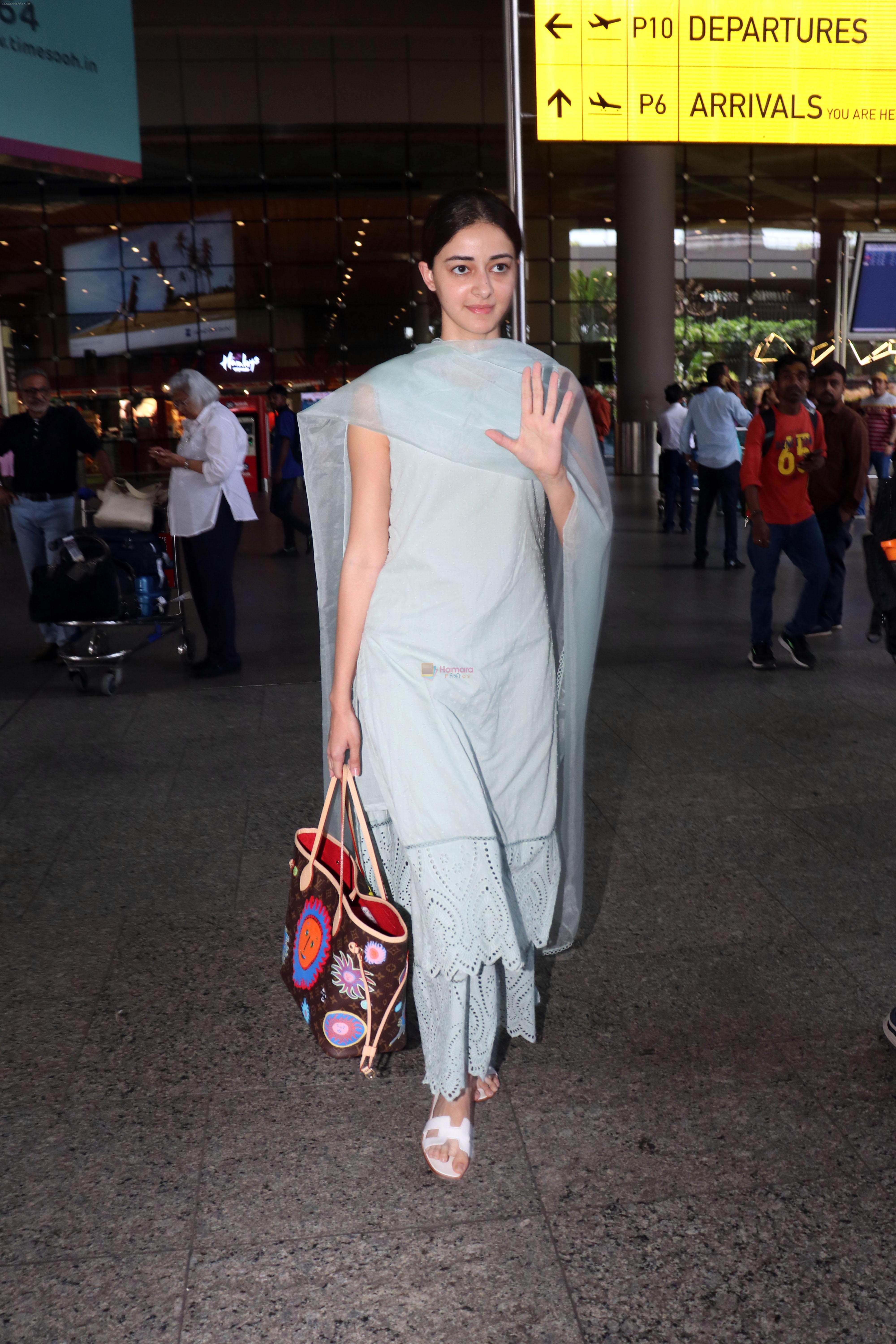 Ananya Panday holding Louis Vuitton LVxYK Handbag wearing Powder Blue ...