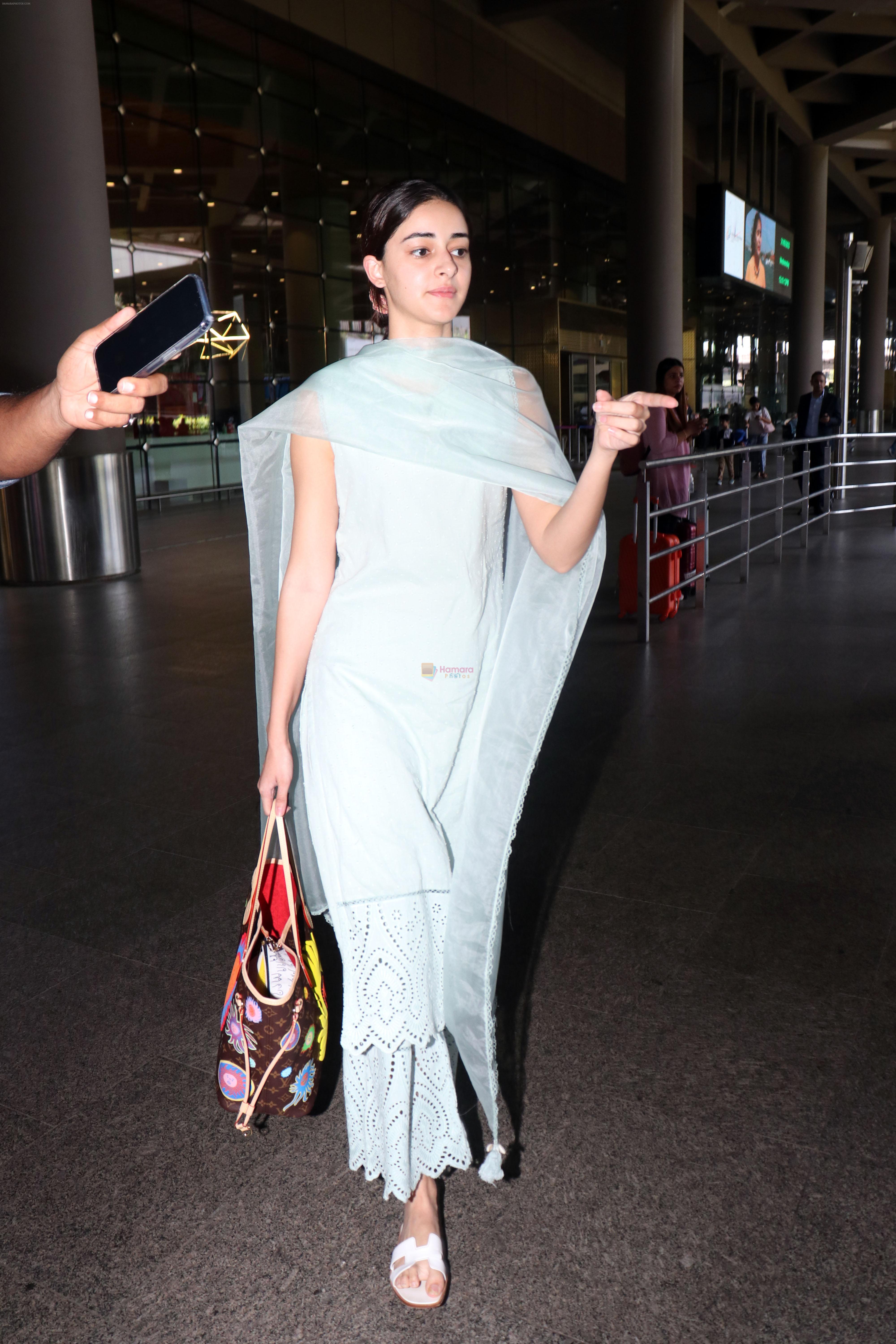 Ananya Panday holding Louis Vuitton LVxYK Handbag wearing Powder Blue ...