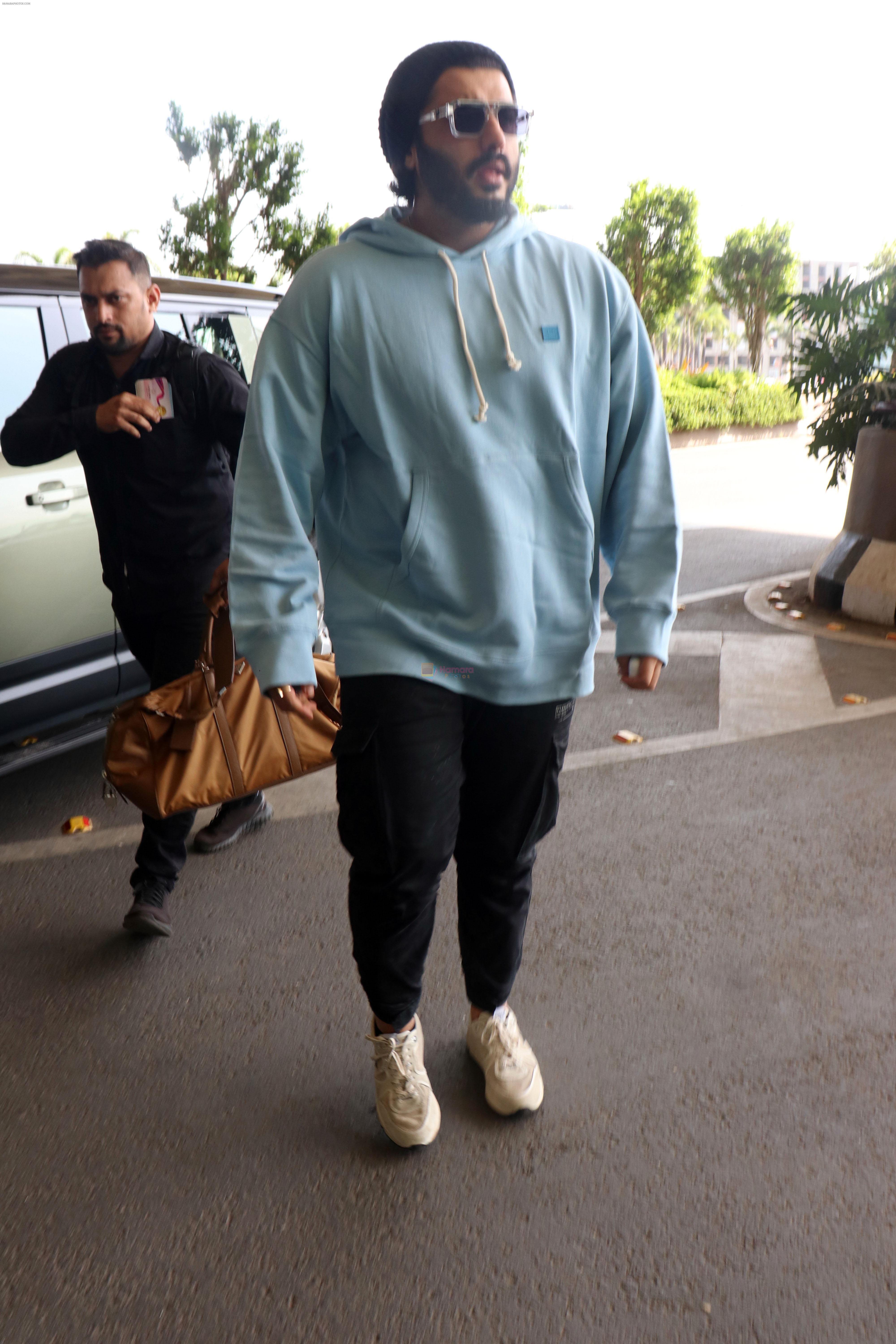 Arjun Kapoor with sunglasses on wearing Powder Blue Hooded Sweatshirt ...