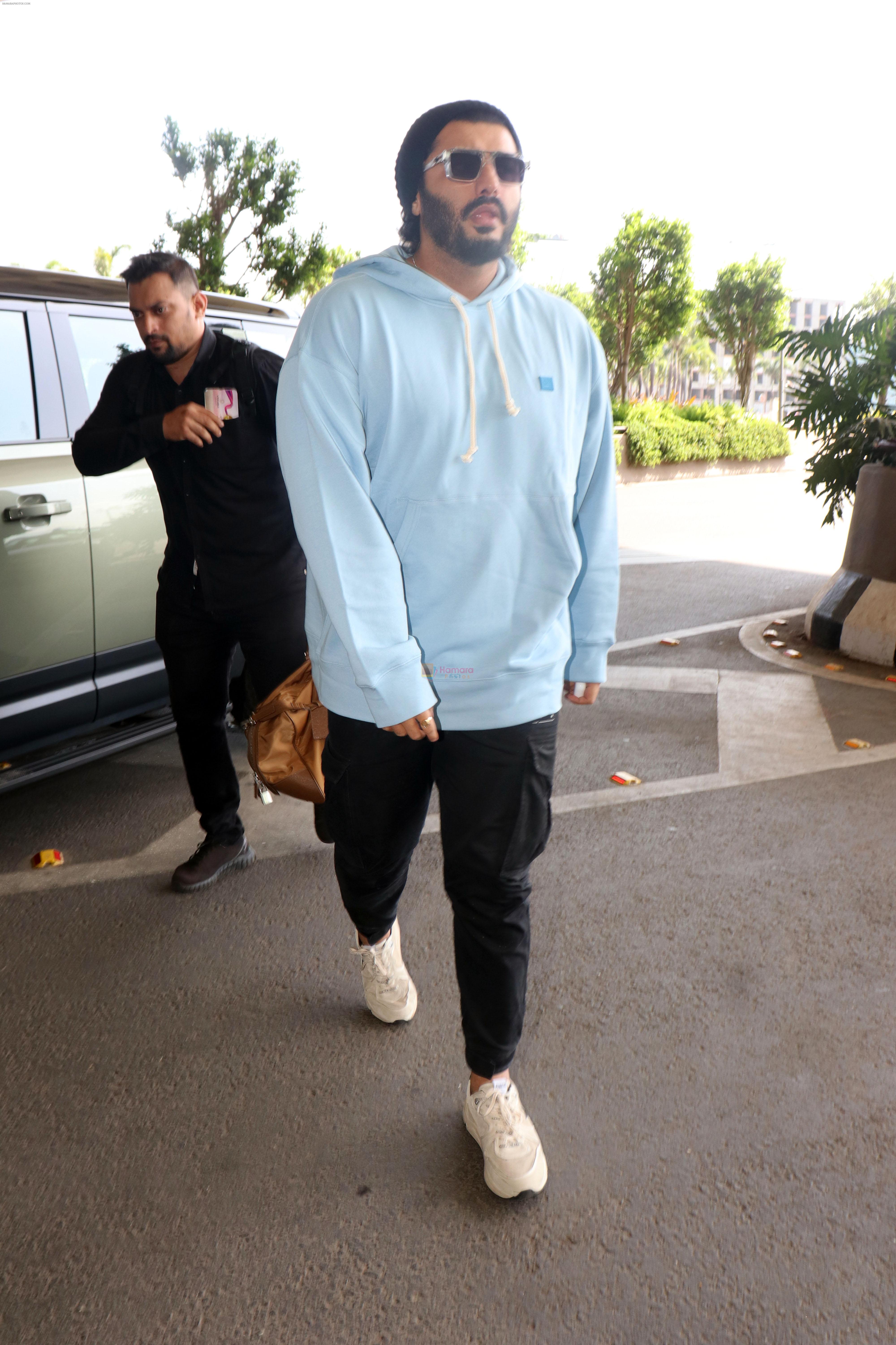 Arjun Kapoor with sunglasses on wearing Powder Blue Hooded Sweatshirt ...