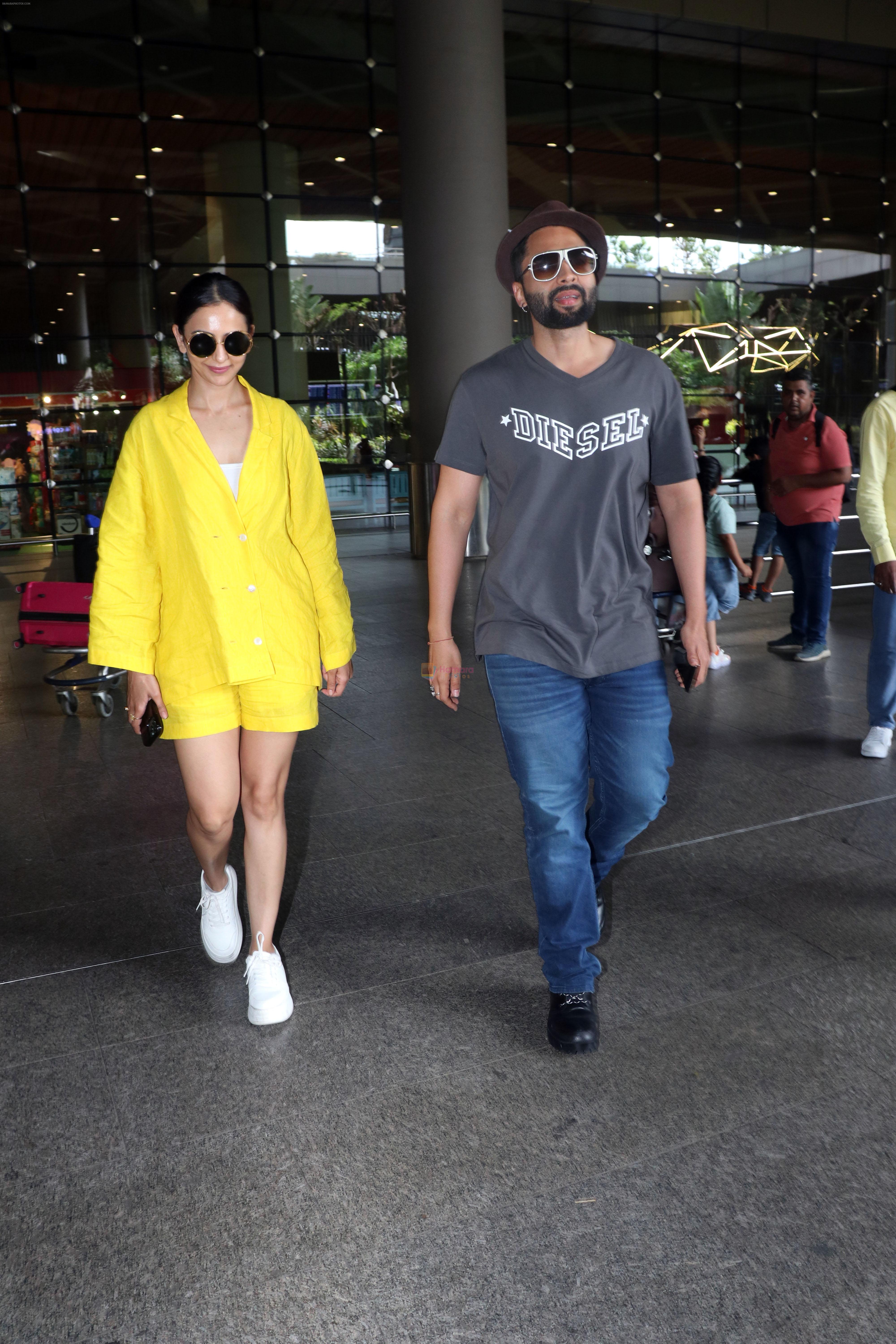 Rakul Preet Singh dressed in yellow Kiara Jacket and Jackky Bhagnani in ...