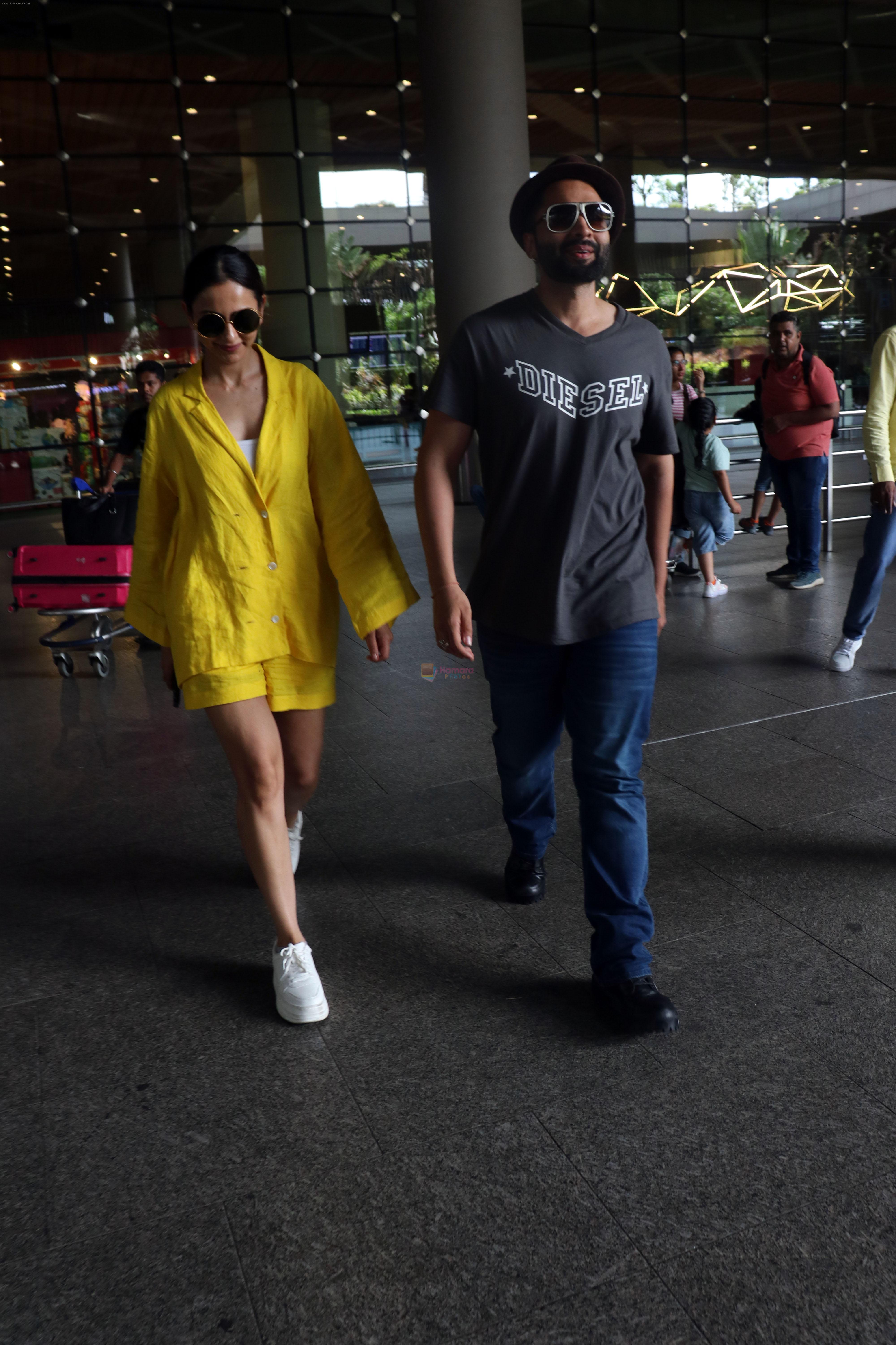 Rakul Preet Singh dressed in yellow Kiara Jacket and Jackky Bhagnani in ...