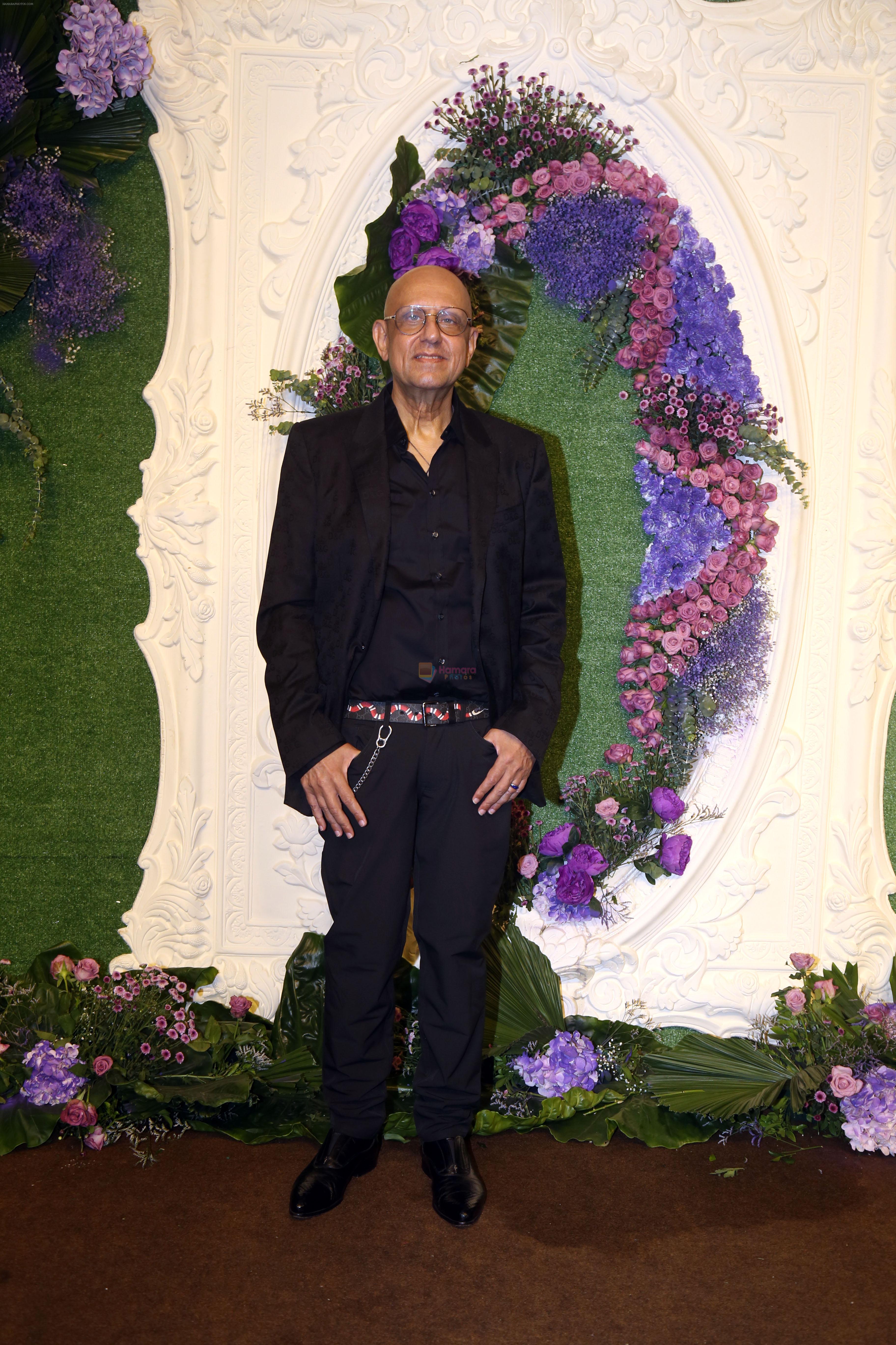 Rajiv Gulshan Rai Pose for media at the reception of Karan Deol and ...