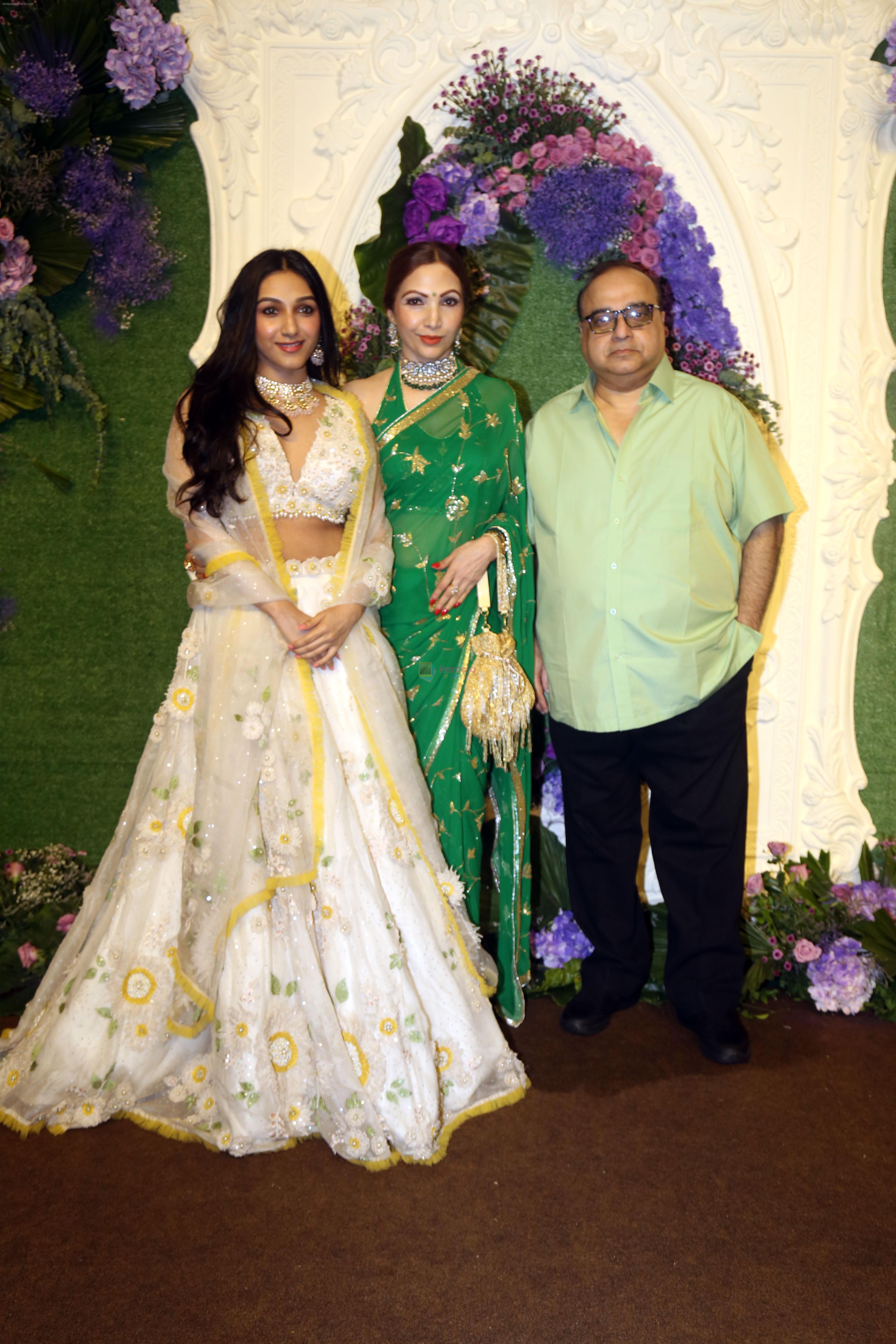 Rajkumar Santoshi with wife Manila and daughter Tanisha Pose for media ...
