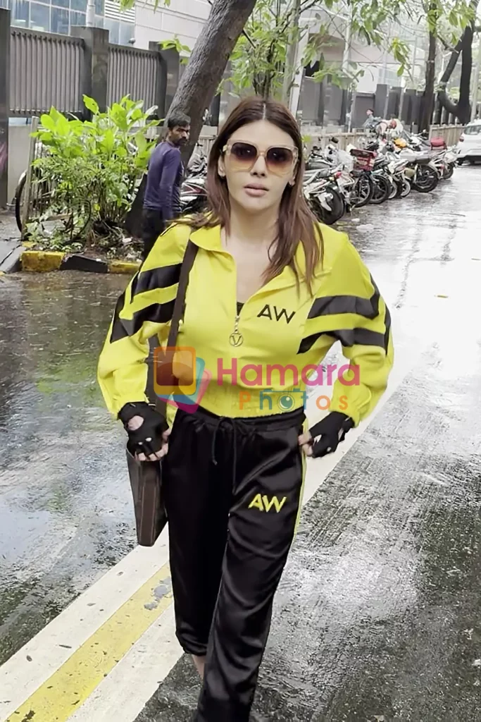 Sherlyn Chopra Spotted in Bold Yellow Tracksuit in Juhu