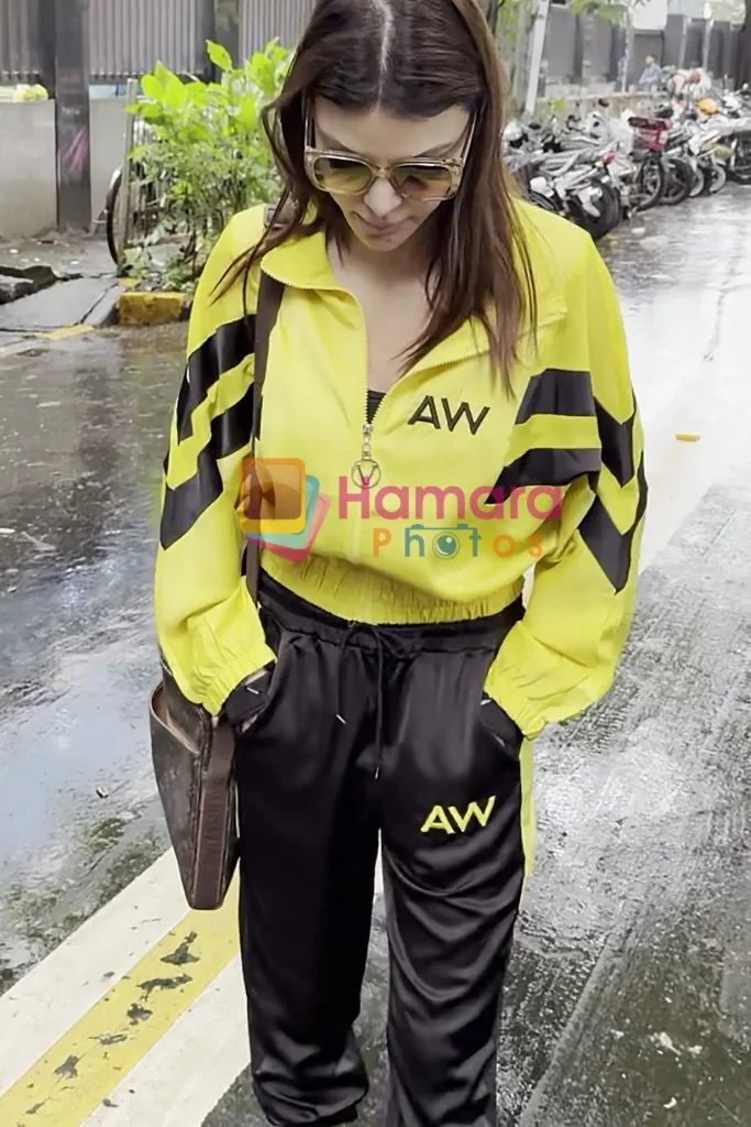 Sherlyn Chopra Spotted in Bold Yellow Tracksuit in Juhu